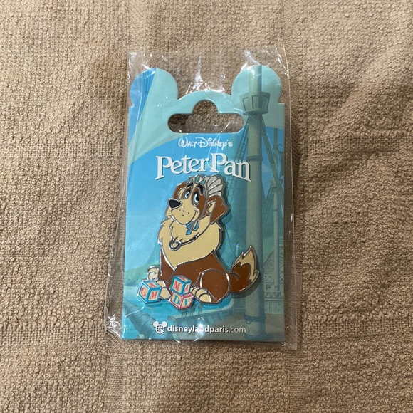 Disney | Accessories | Disney Dlp Paris 28 Exclusive Peter Pan Nana Dog ...